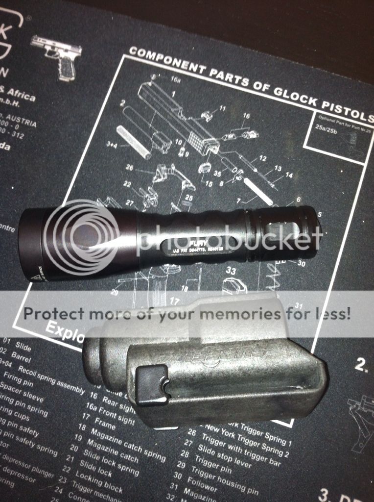 Surefire fury flashlight with surefire V70 holder for sale or trade ...