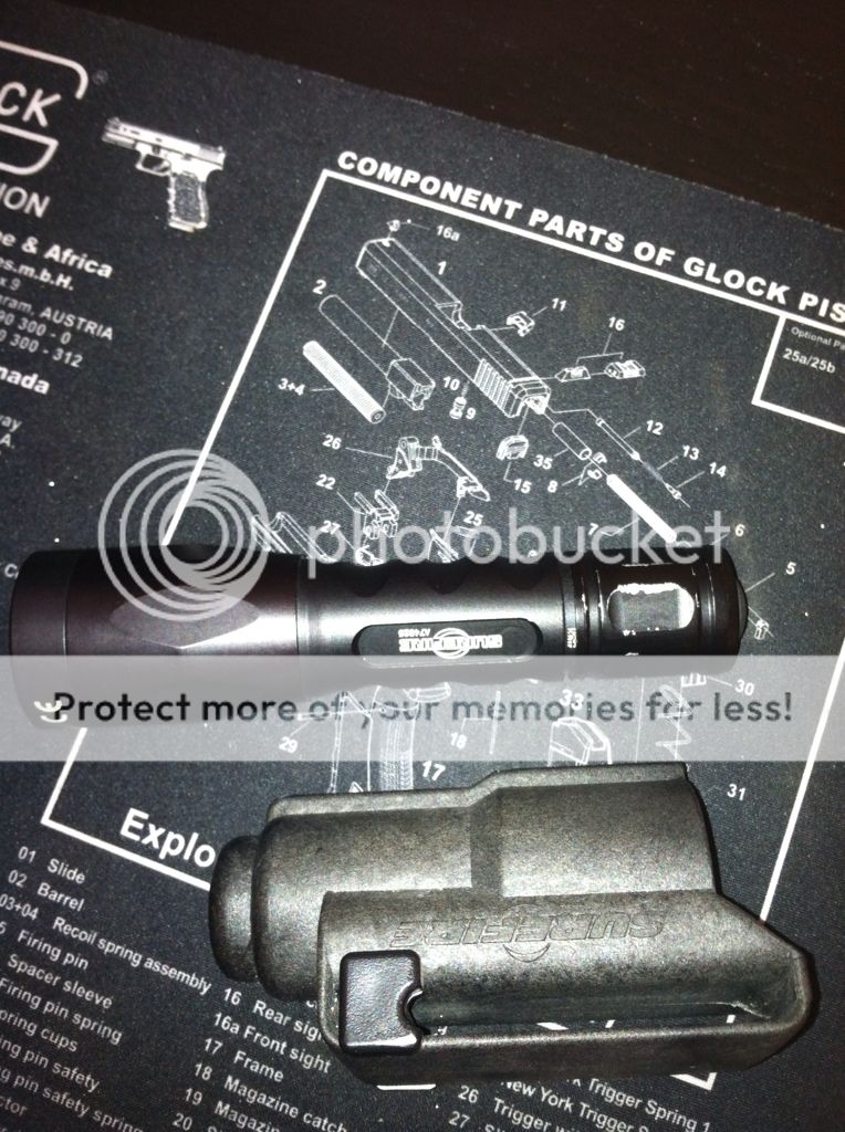 Surefire fury flashlight with surefire V70 holder for sale or trade ...